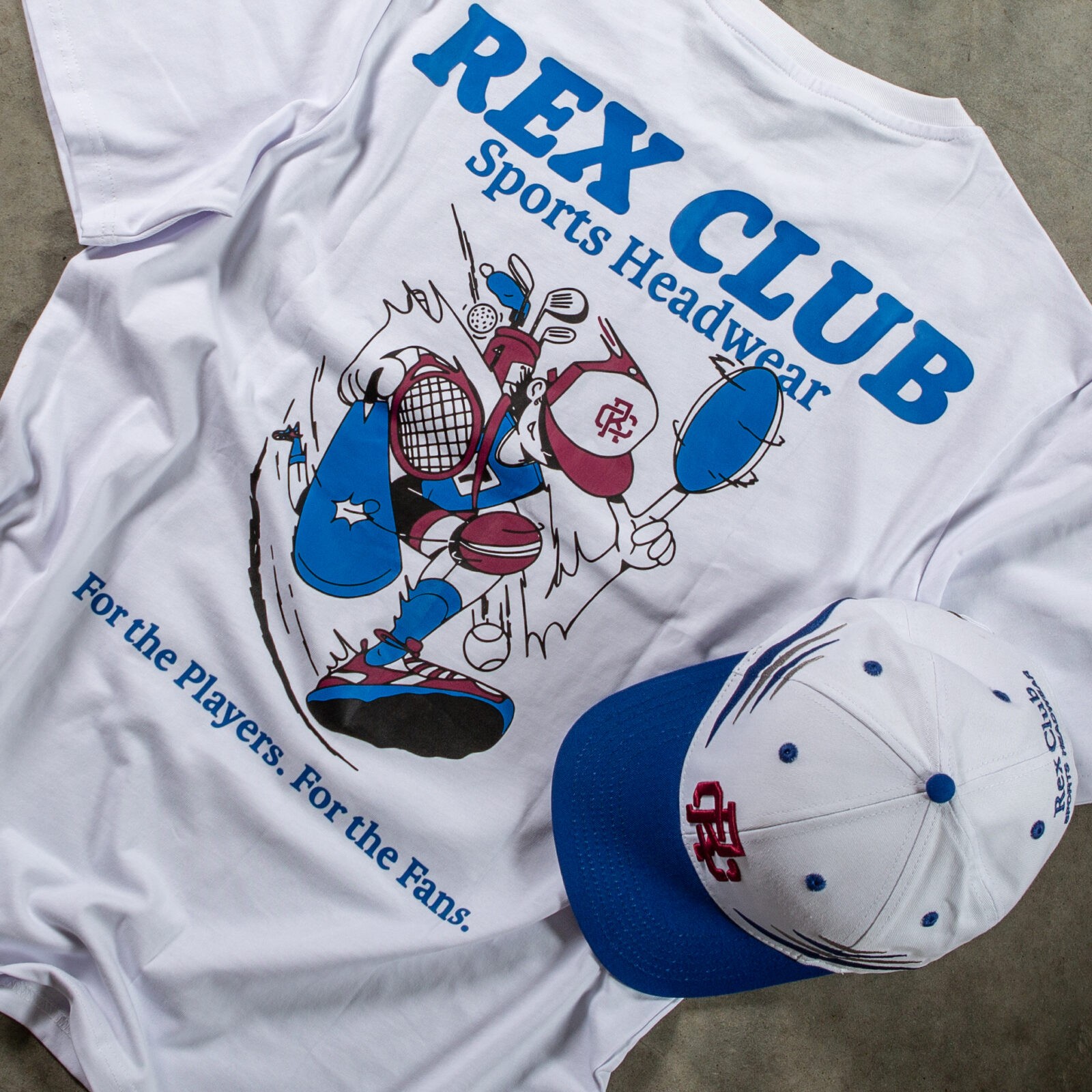 Rex Club | A white T-shirt featuring a baseball player graphic and the ...